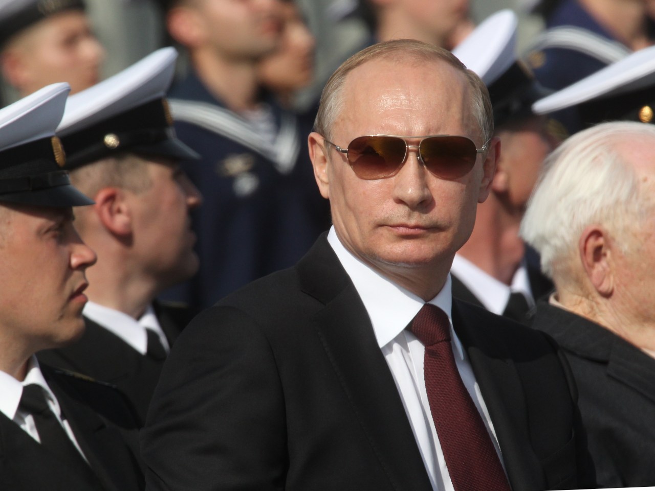 New headache for Putin as court awards Yukos shareholders $50 billion ...