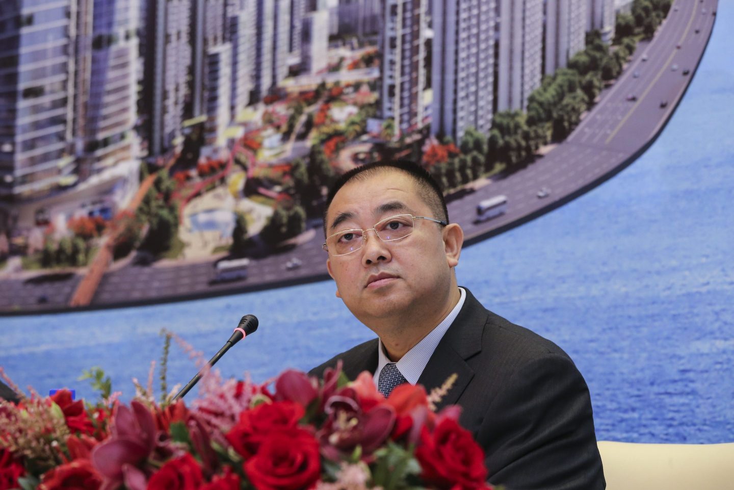 Evergrande's top execs resign as investigation of mysterious bank ...