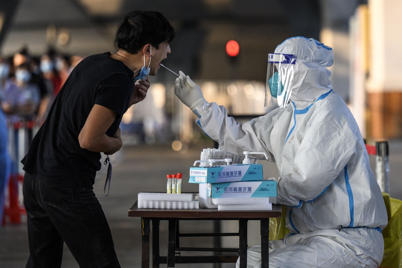 Overwhelmed by a massive outbreak, China authorizes emergency use of ...