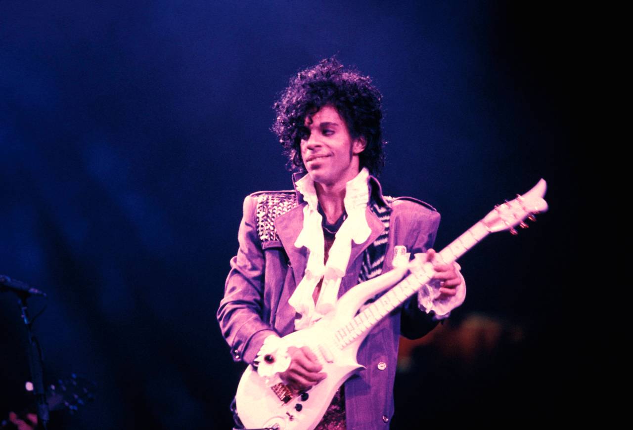 Prince's white ruffled 'Purple Rain' shirt and iconic blue high-heeled ...