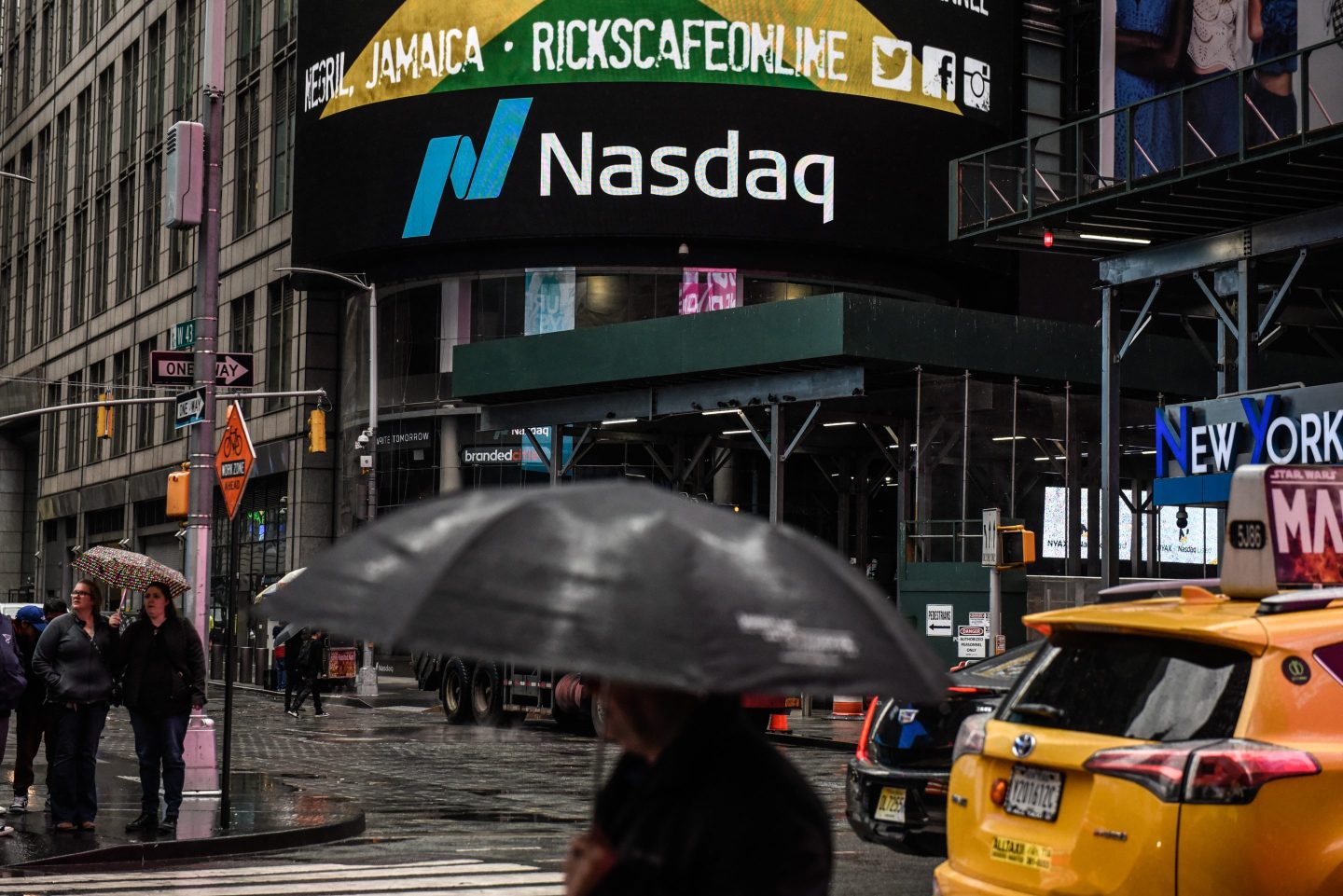 Nasdaq soars to a record high and is on track for its biggest annual ...
